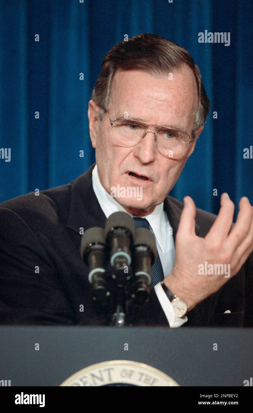U.S. President George H. Bush answers a question, Tuesday, Feb. 6, 1991 ...