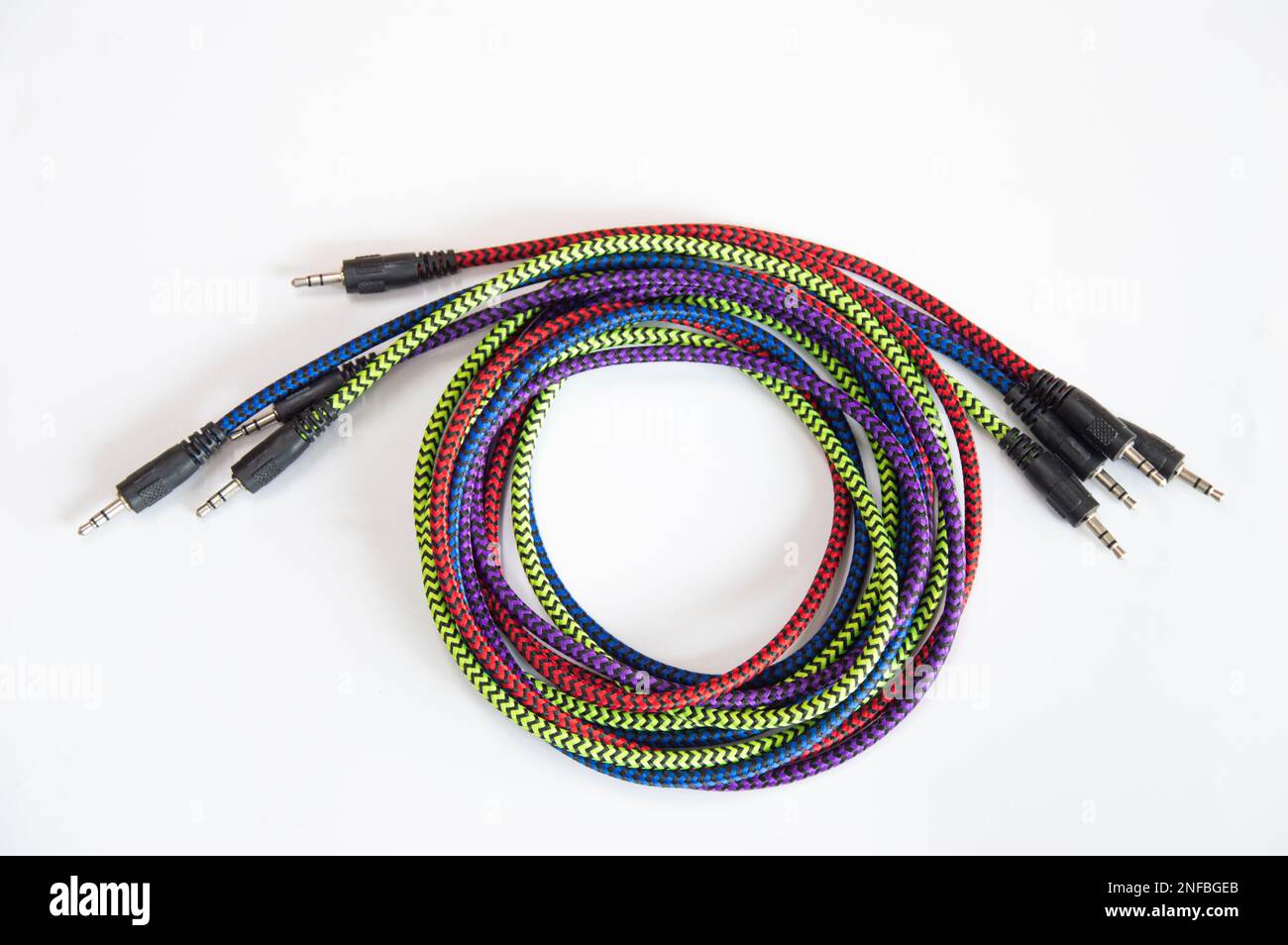 AUX audio cable on a white background Stock Photo - Alamy