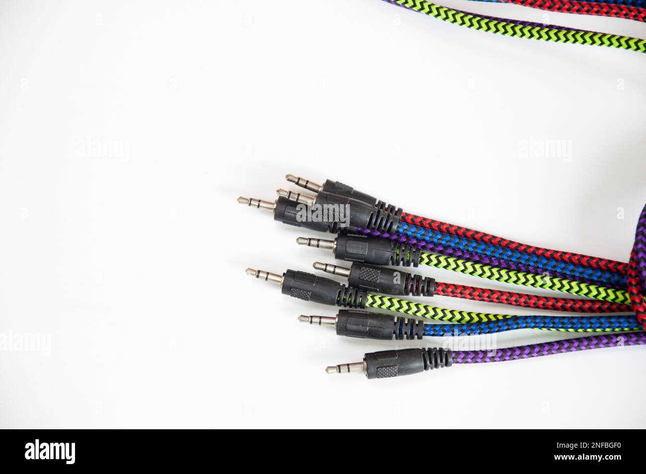AUX audio cable on a white background Stock Photo - Alamy