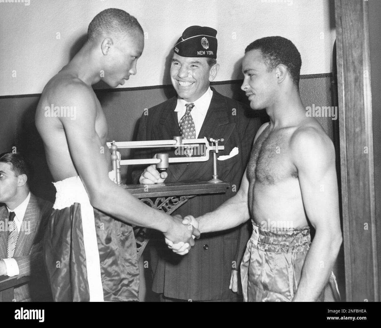 Flashy Sebastian, right, and Ray Robinson, left, welterweight boxing ...