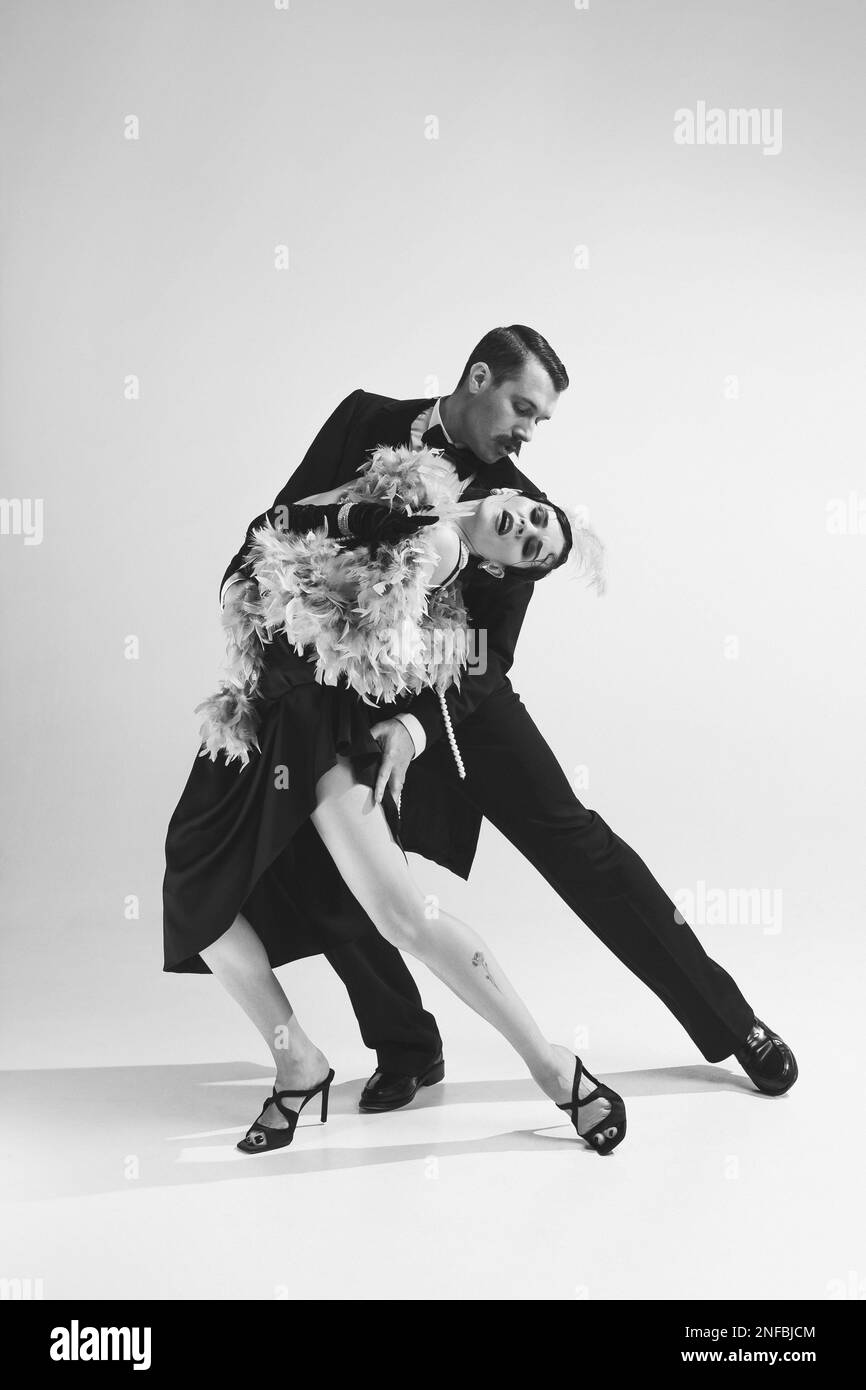 Adorable passionate couple of dancers dancing tango. Man and woman in ...