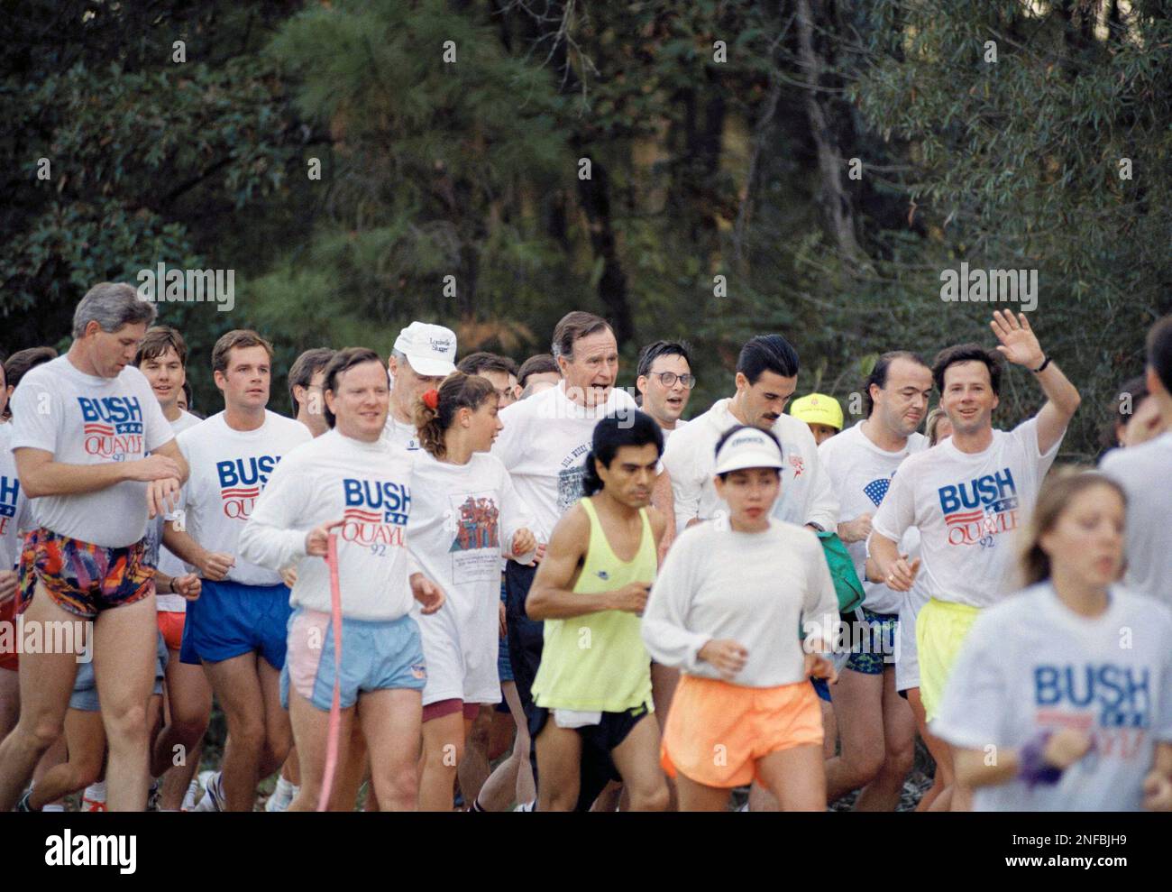 U.S. President George H. Bush takes an early morning jog in Houston's ...