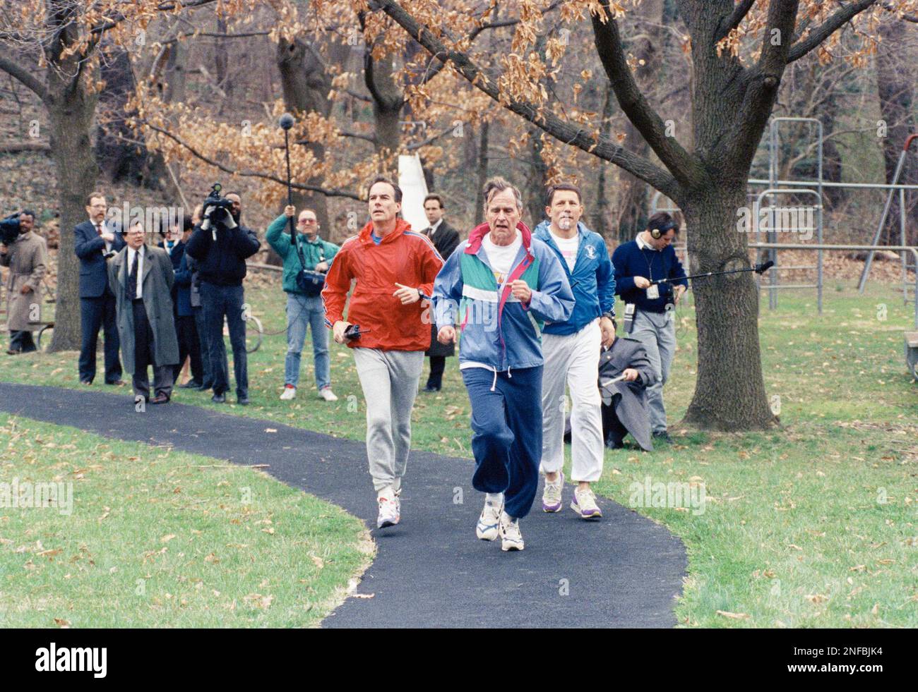 U.S. President George H. Bush, along with an unidentified aide and ...