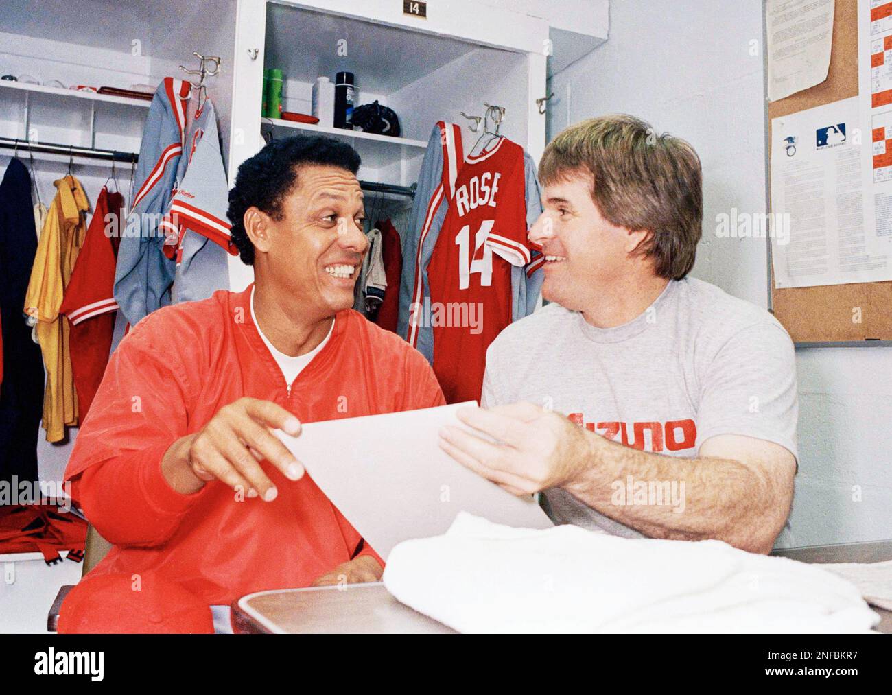 Cincinnati Reds suspended manager Pete Rose talks with coach Tony Perez ...