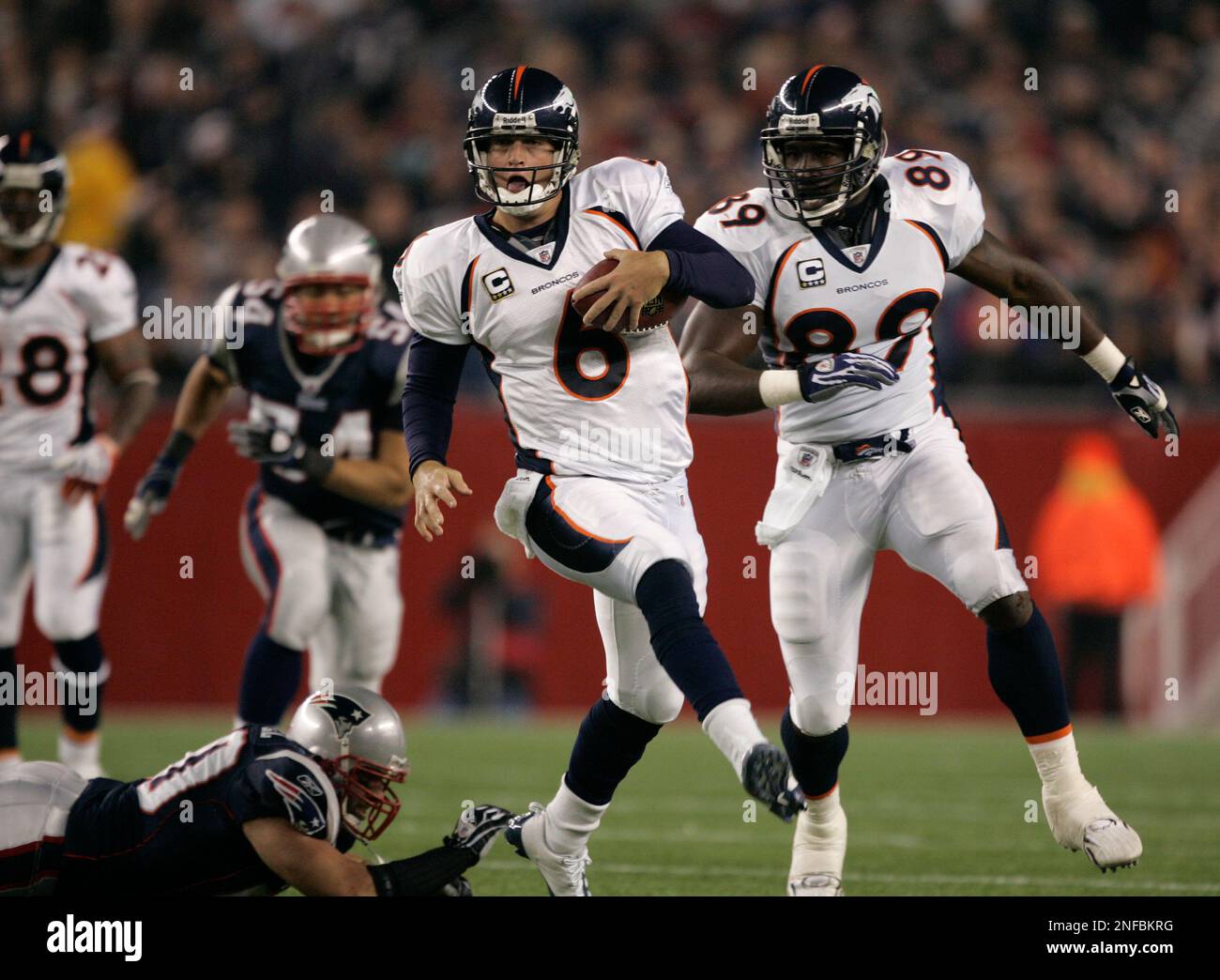 Denver Broncos quarterback Jay Cutler (6) and Daniel Graham (89) in the ...