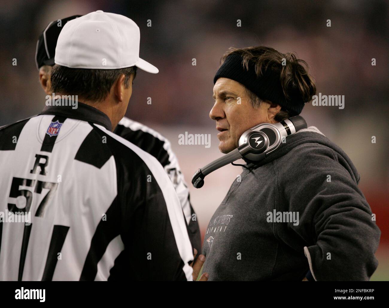 New England Patriots head coach Bill Belichick talks with referees in ...