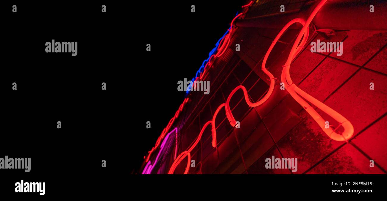 Illuminated letters and words made with neon lights and LEDs of many ...