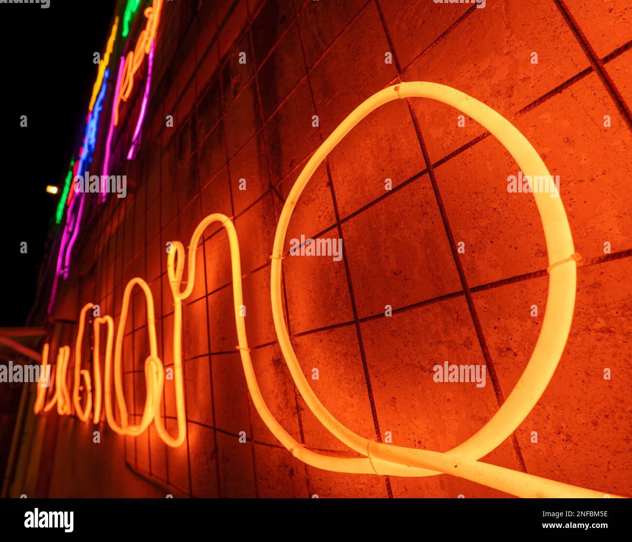 Illuminated letters and words made with neon lights and LEDs of many ...