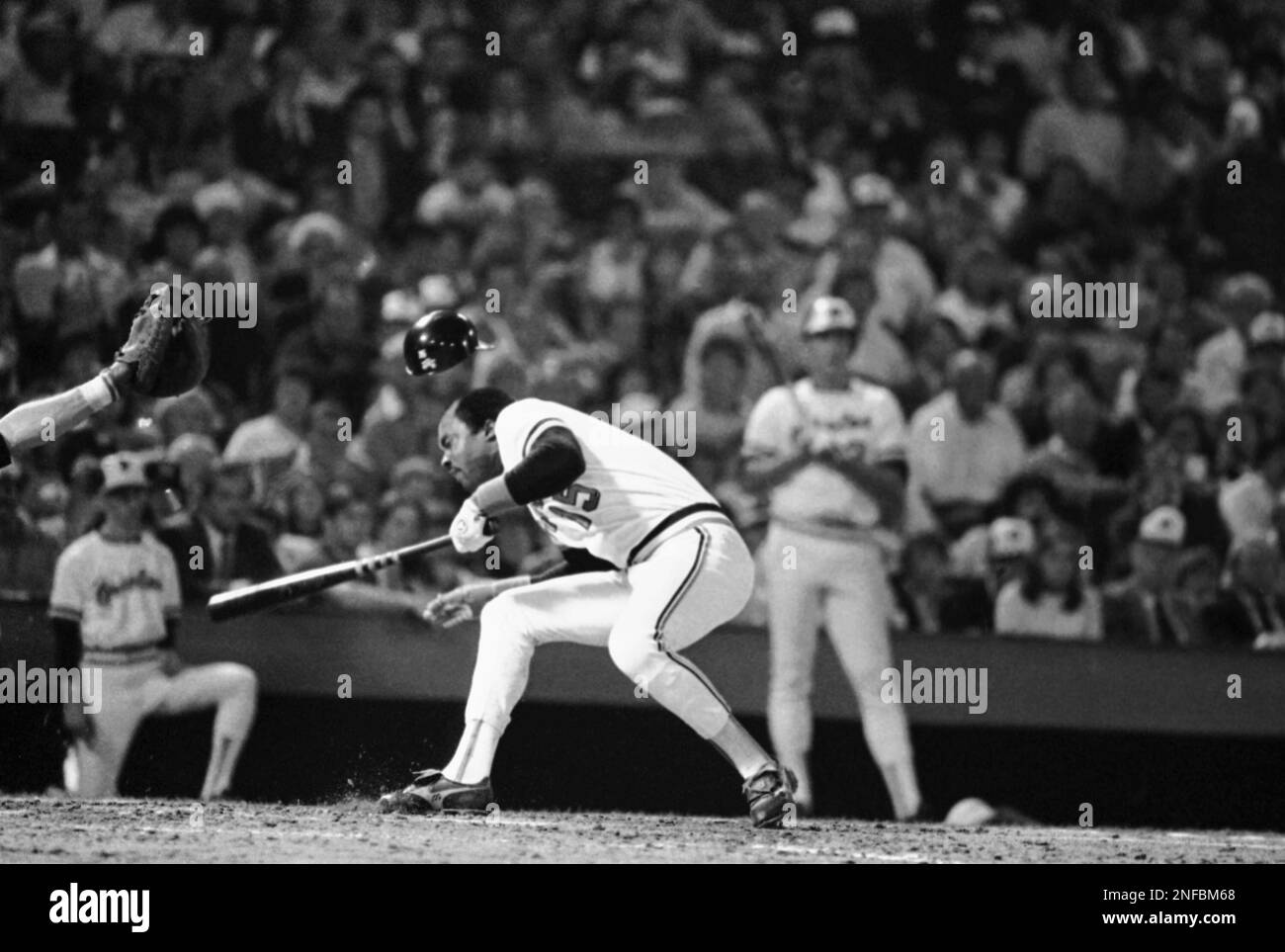 Baltimore Orioles batter Dan Ford tumbles after being hit in the head ...