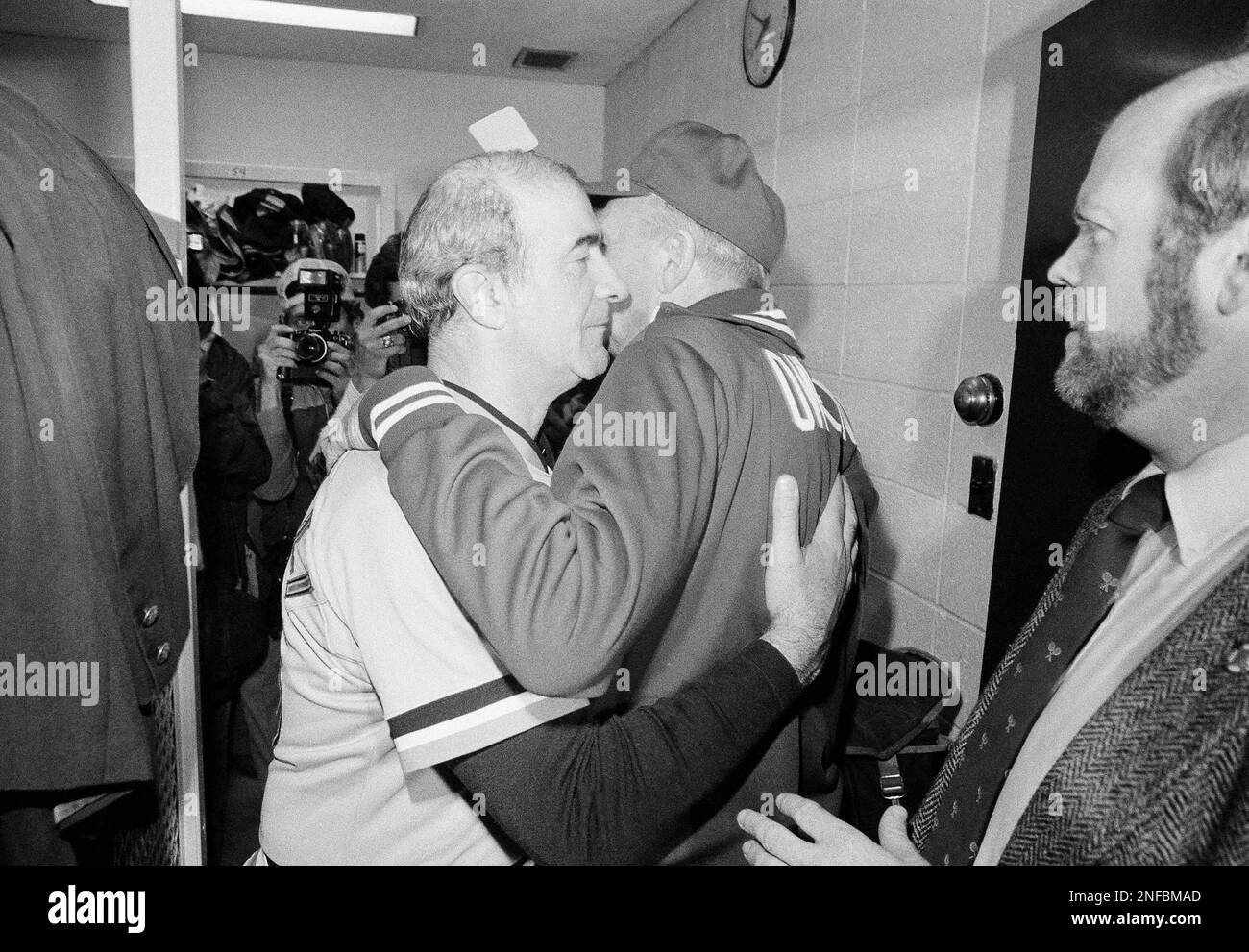 Baltimore Orioles manager Joe Altobelli, left, is hugged by ...
