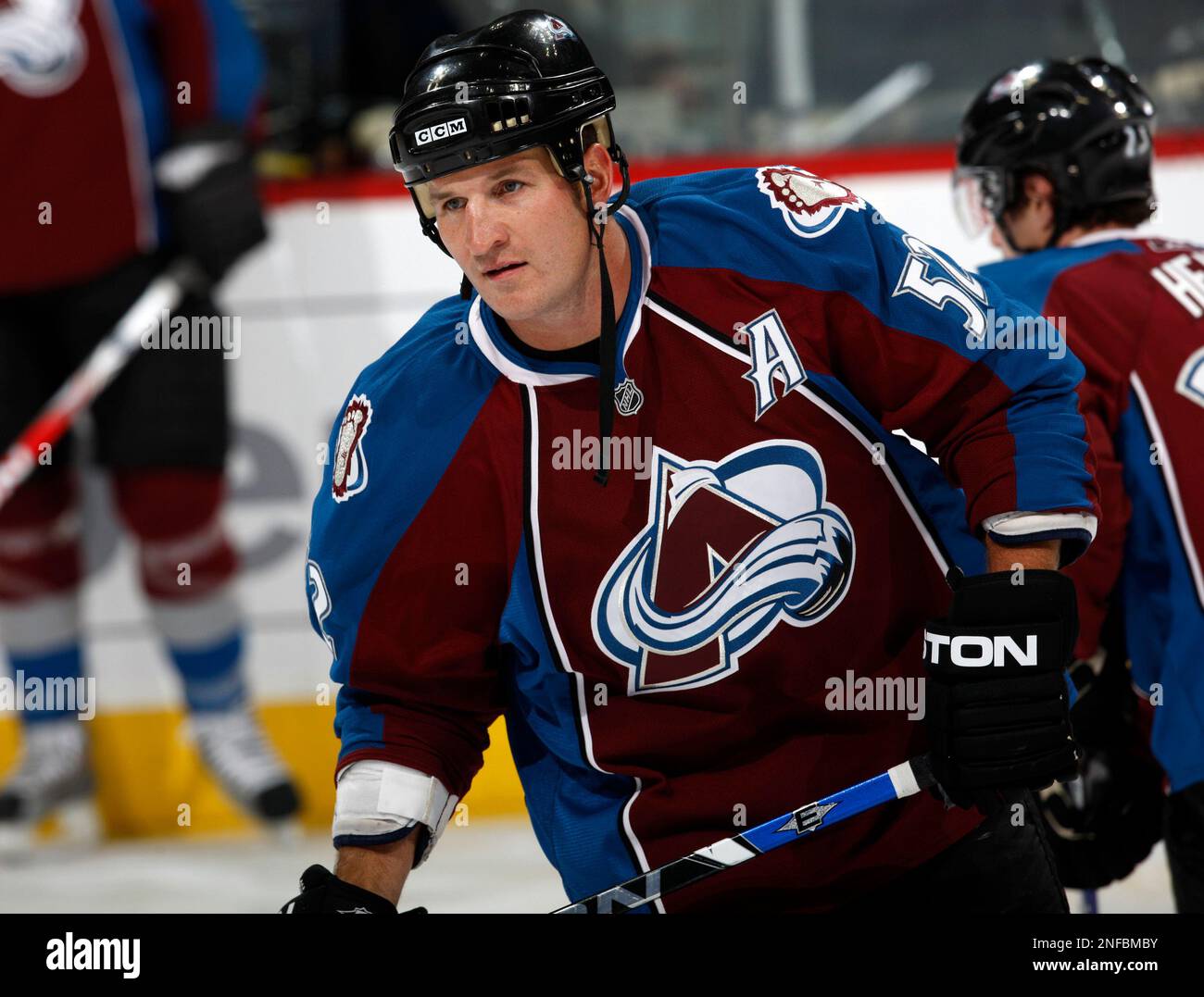 Colorado Avalanche defenseman Adam Foote warms up before facing the ...