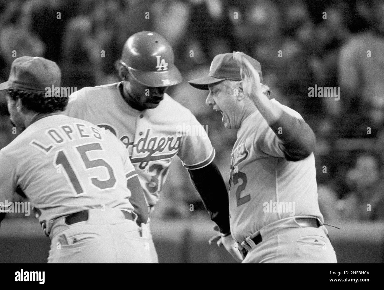 Los Angeles Dodgers manager Tommy Lasorda, right, congratulates Dodgers ...
