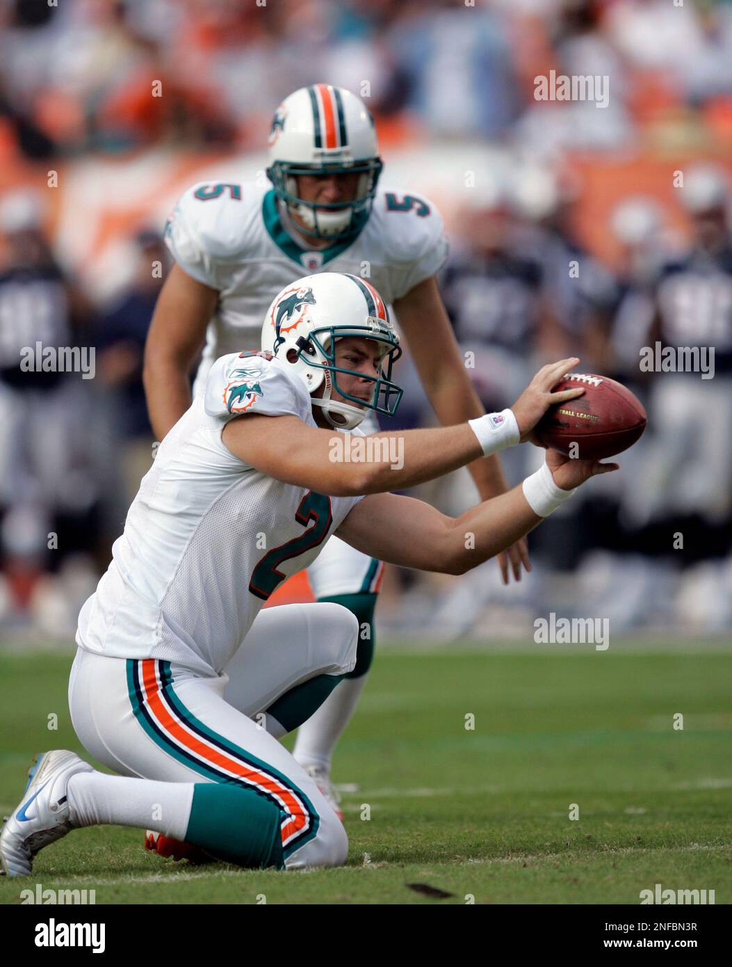 Miami Dolphins' Brandon Fields (2) prepares to place the ball for ...