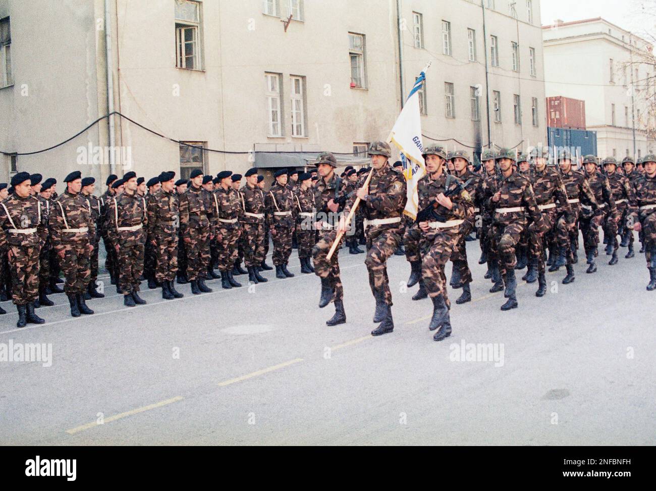 Bosnian soldiers are seen on parade at a military barracks in Sarajevo ...