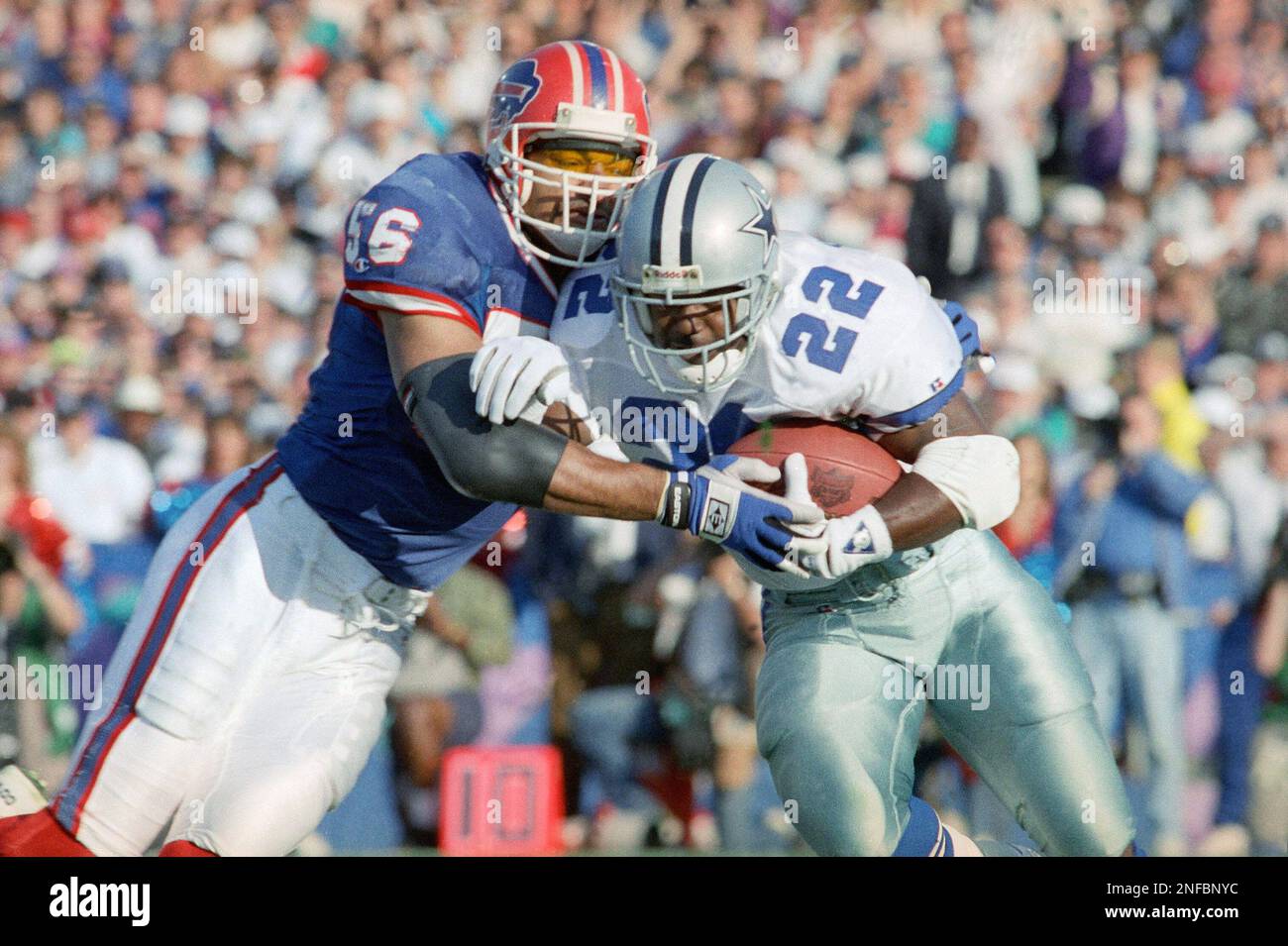 Dallas Cowboys' Emmitt Smith (22) gains yardage on Buffalo Bills Darryl ...