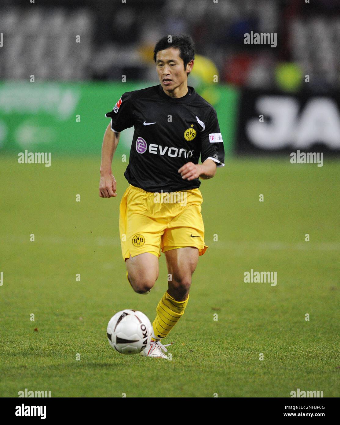 Dortmund's Lee Young-Pyo goes for the ball during the German first ...