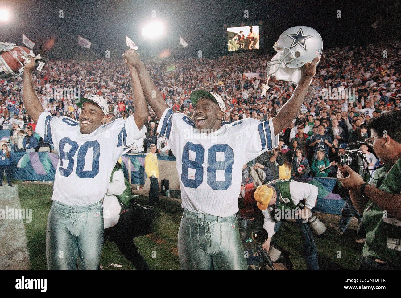 Dallas Cowboys wide receivers Alvin Harper, left, and Michael Irvin ...