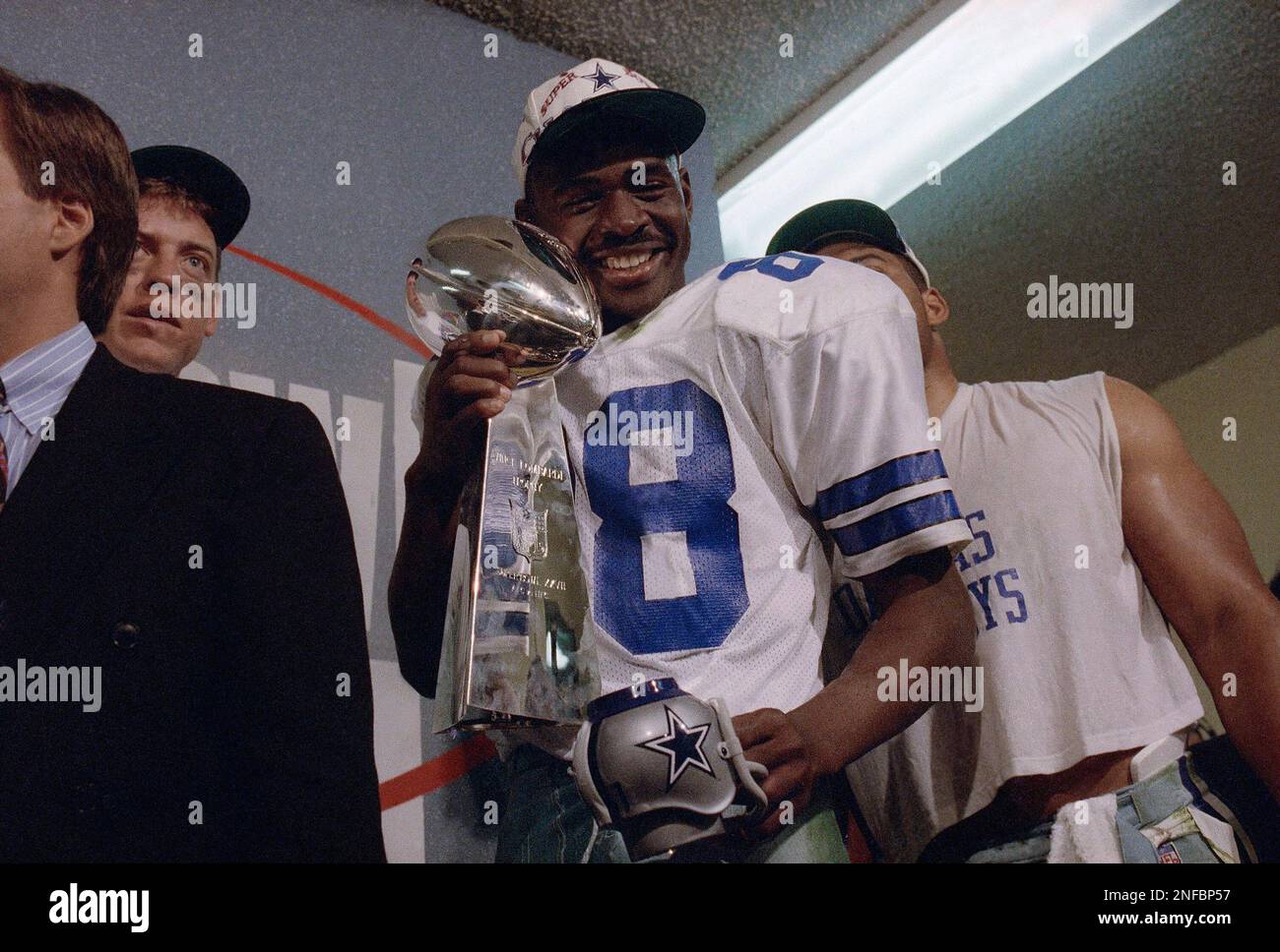 Dallas Cowboys wide receiver Michael Irvin is all smiles as he proudly ...