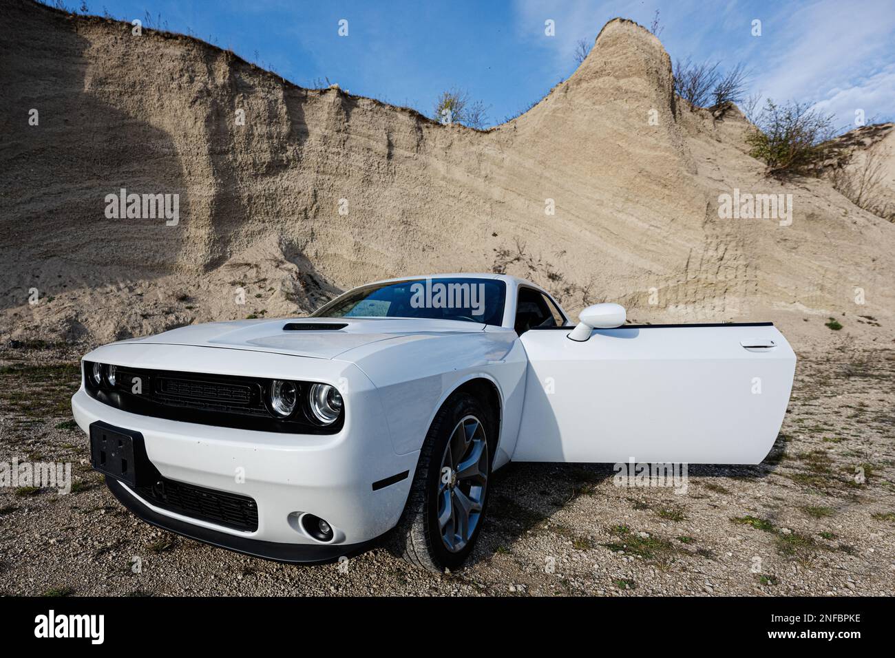 White powerfull american muscle car in career Stock Photo - Alamy