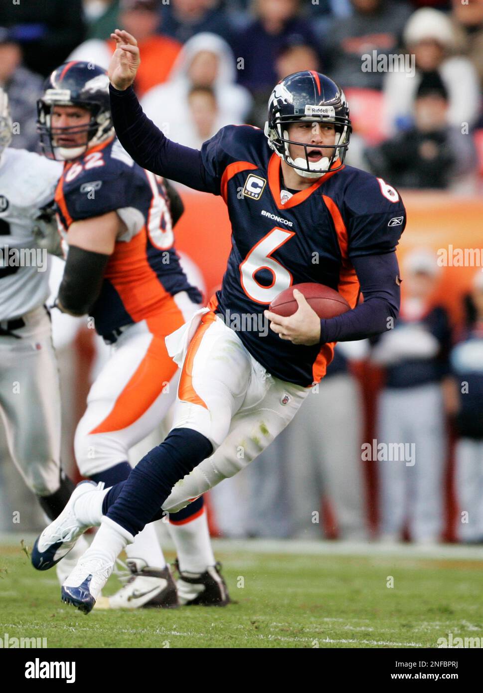 Denver Broncos quarterback Jay Cutler runs against the Oakland Raiders ...