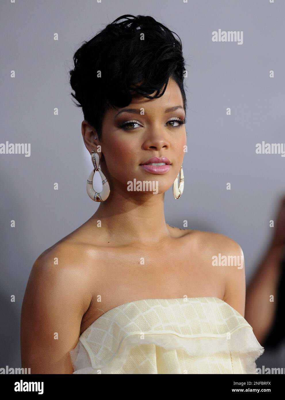 Rihanna arrives at the American Music Awards in Los Angeles on Sunday ...