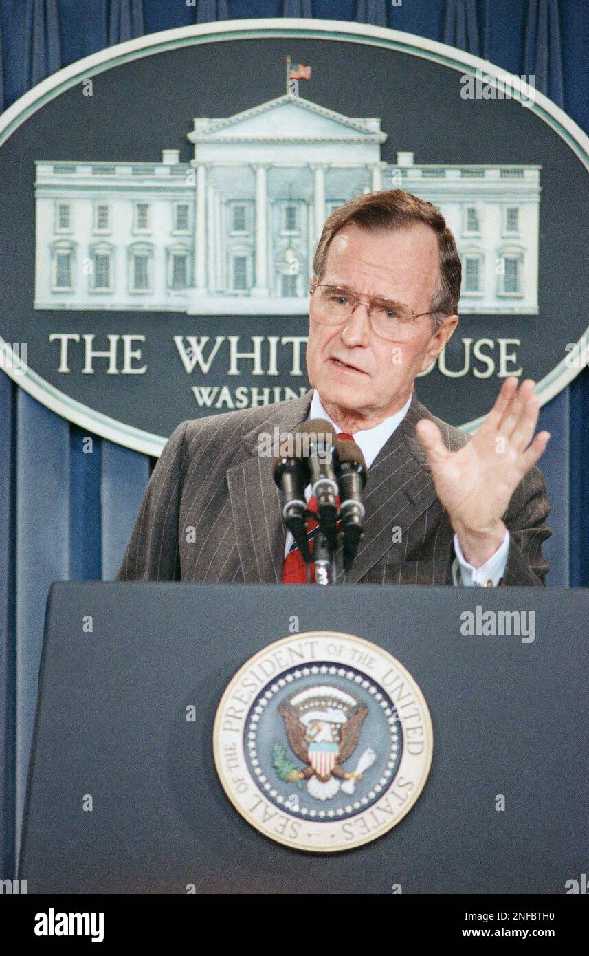 U.S. President George H. Bush gestures during a news conference in the ...