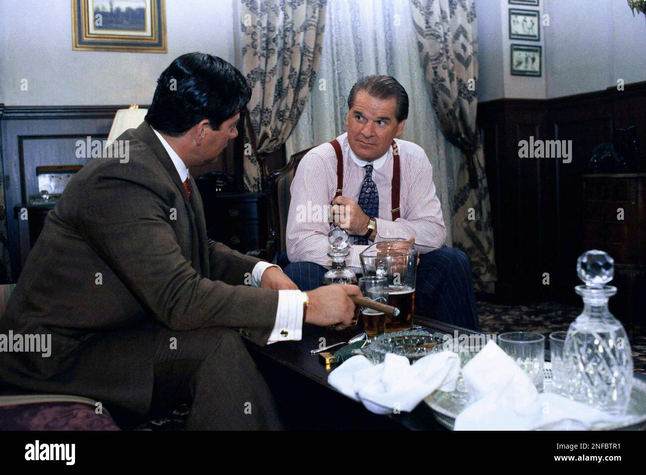 Pete Rose talks with actor Stephen Lang, left, on the set during ...