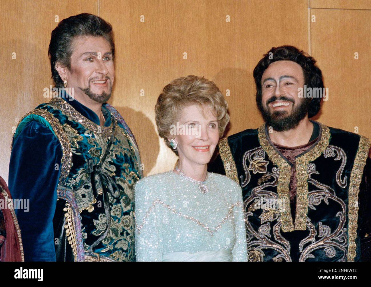 Nancy Reagan, center, poses with opera stars Luciano Pavarotti, right ...