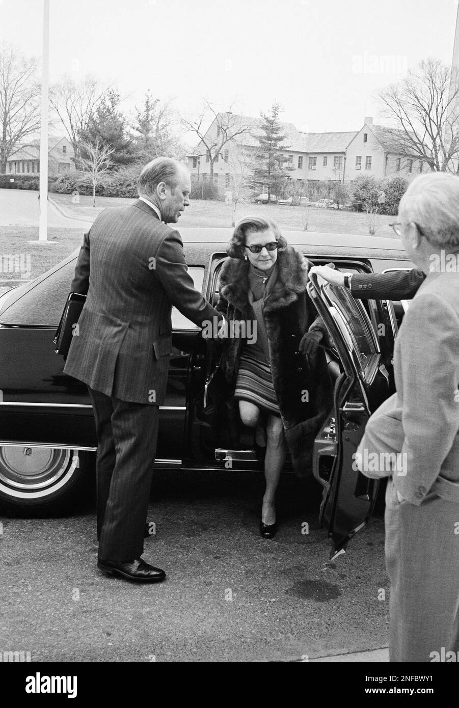 Vice President Gerald Ford helps his wife Betty from their car prior to ...