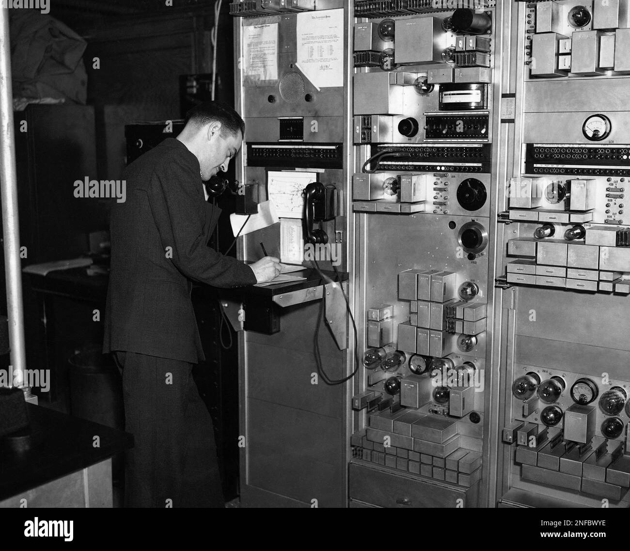 Barney Livingstone is shown at WirePhoto machine in an undated photo ...