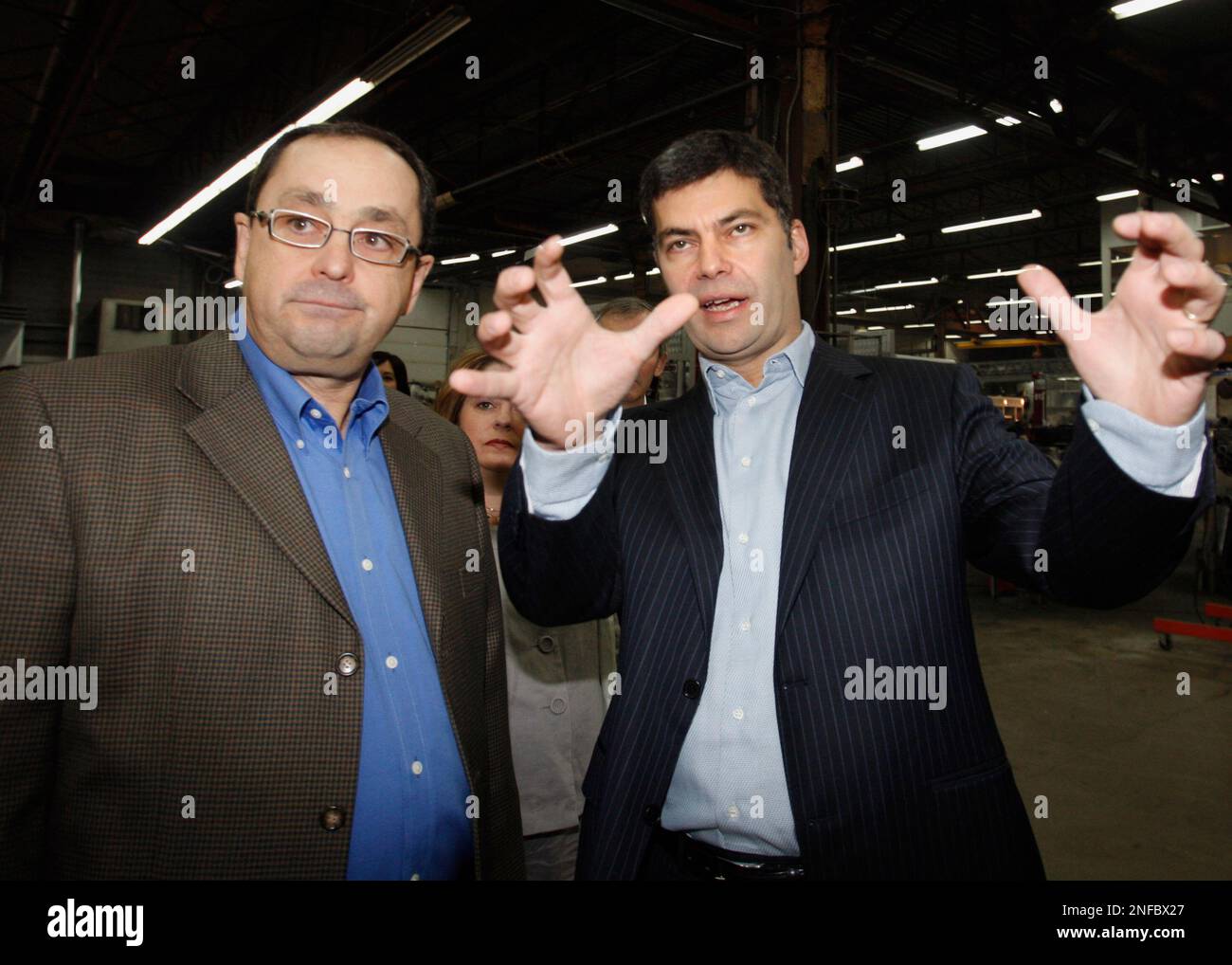 Mario Dumont, leader of the Action democratique du Quebec, right ...