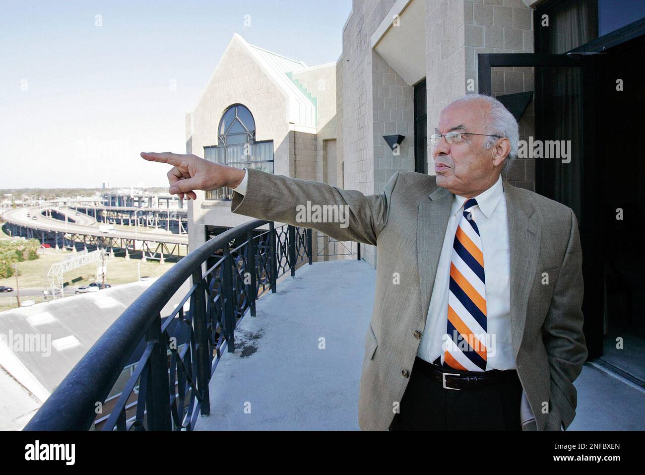 Xavier President Norman Francis points to the city skyline during an ...