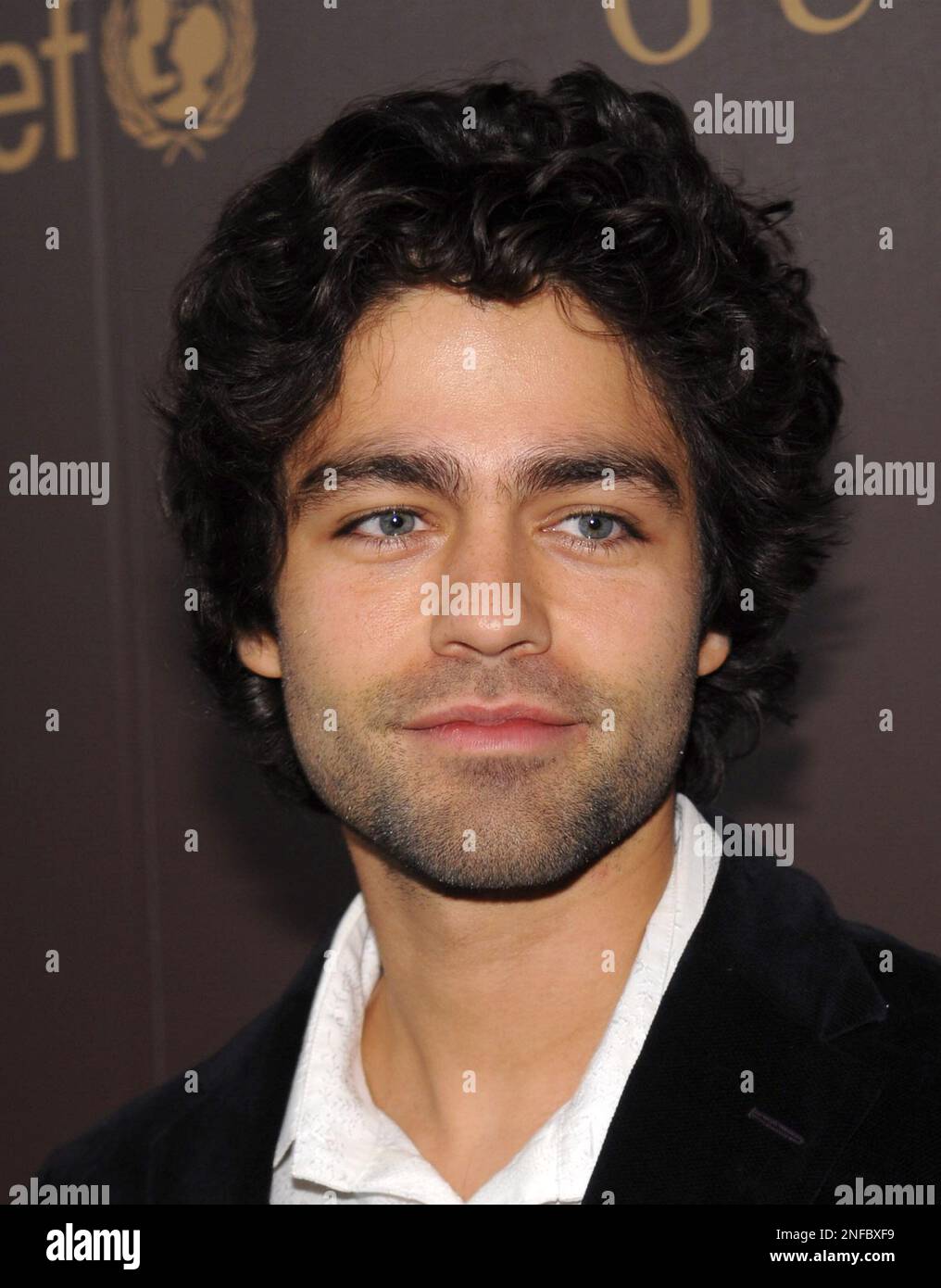 Actor Adrian Grenier attend a Gucci UNICEF dinner at The Oak Room at ...