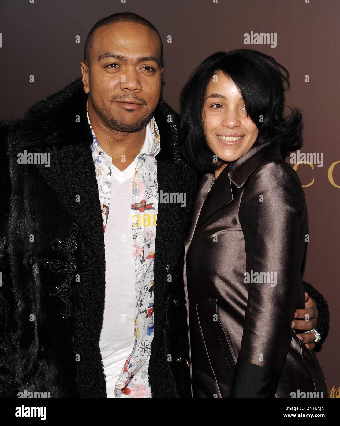 Music producer Tim "Timbaland" Mosely and wife Monique Idlett attends a ...