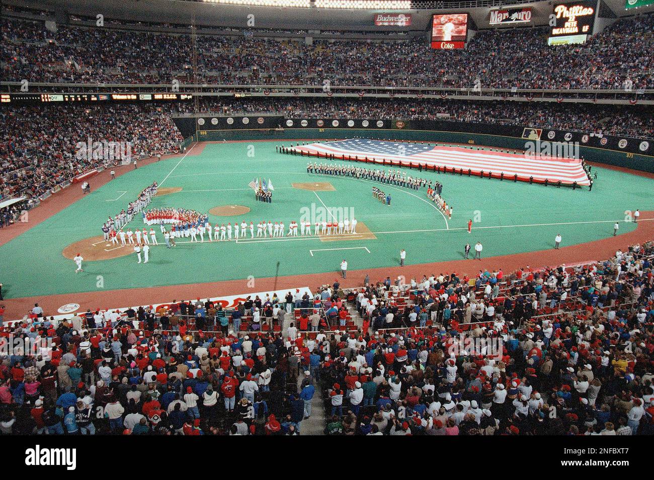 Team members of the Philadelphia Phillies and the Atlanta Braves line ...