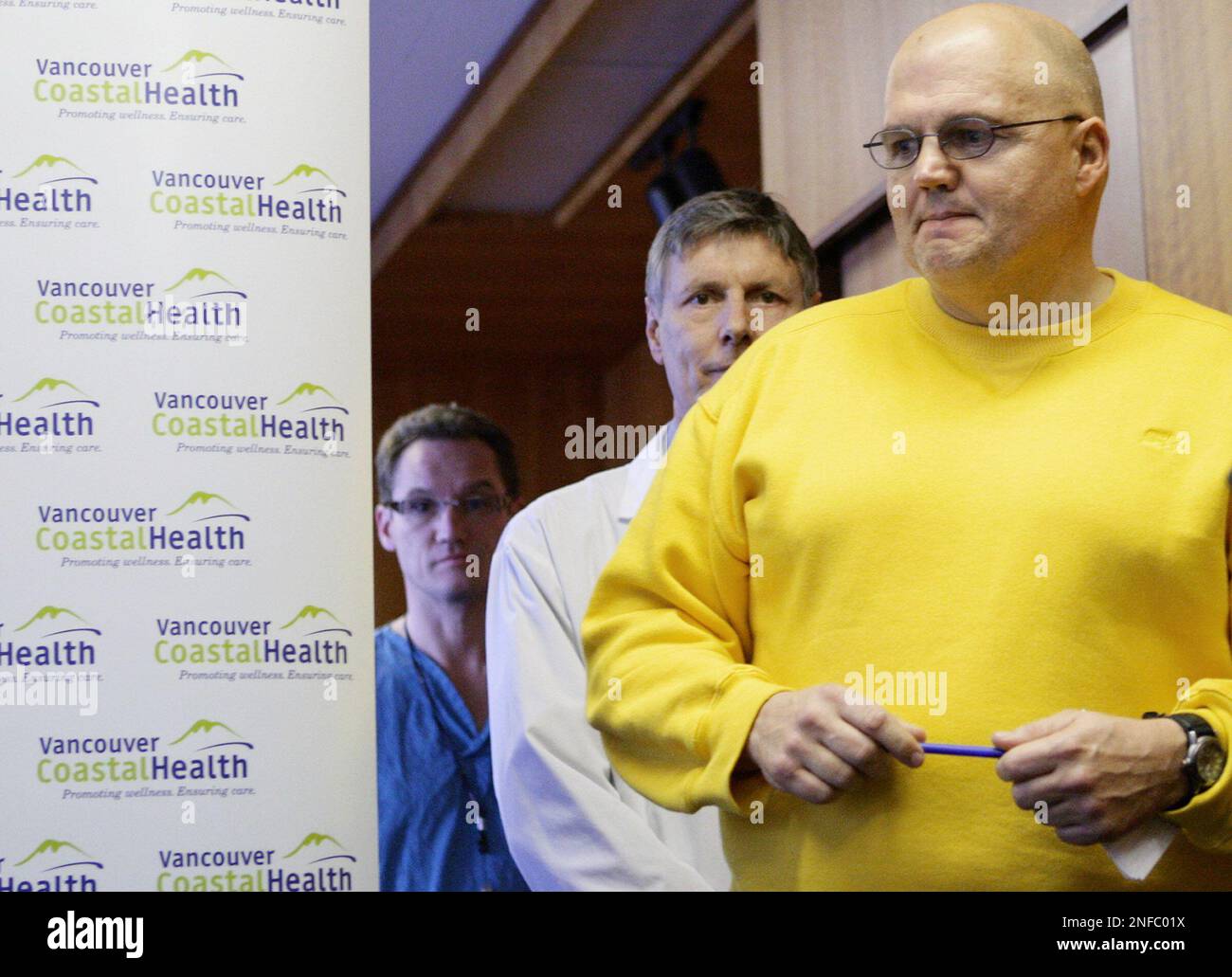 Michael Wilson, right to left, brother of plane crash survivor Thomas Wilson, both of Fort ...