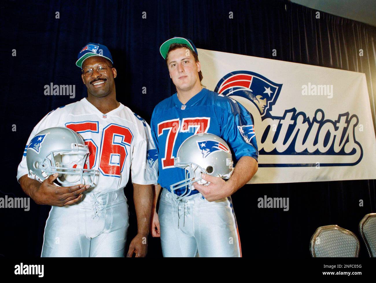 New England Patriot linebacker Andre Tippett, left, and offensive ...
