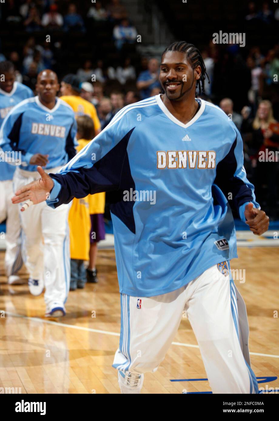 Denver Nuggets forward Nene, of Brazil, warms up before facing the ...