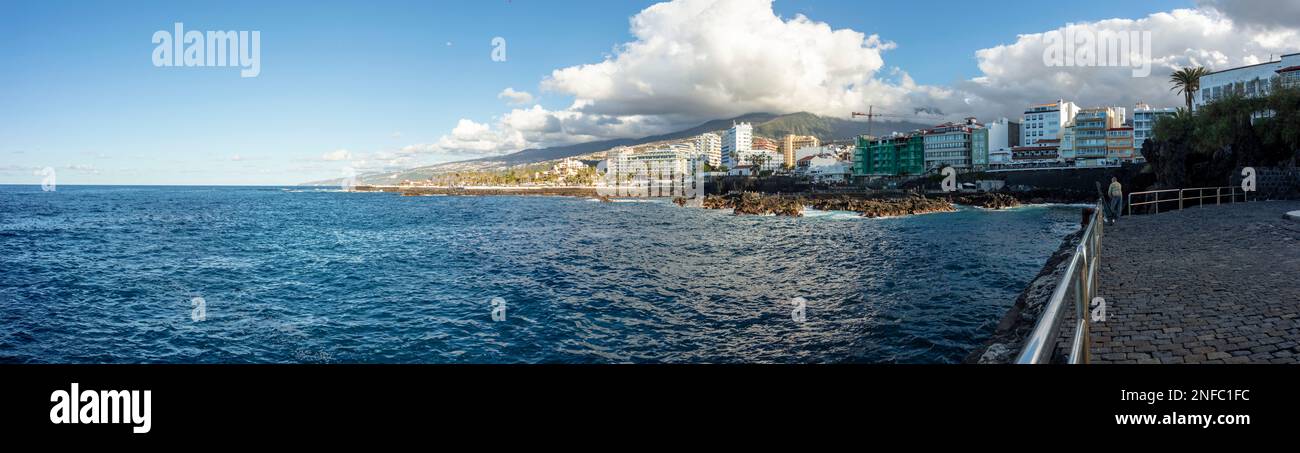 Warm sunshine palliative view from Puerto de la Cruz harbour across the ...