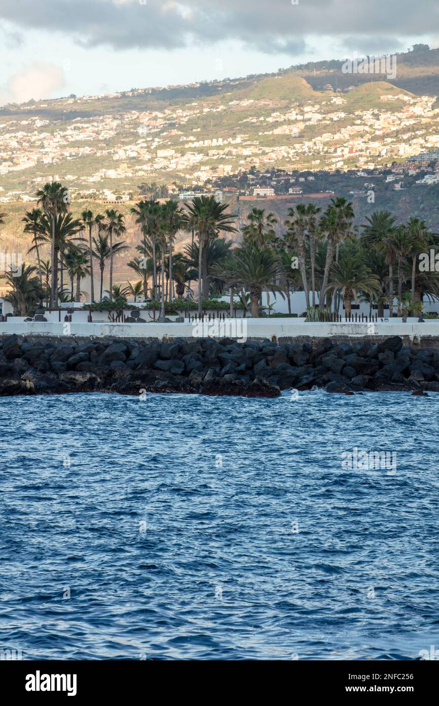 Warm sunshine palliative view from Puerto de la Cruz harbour across the ...