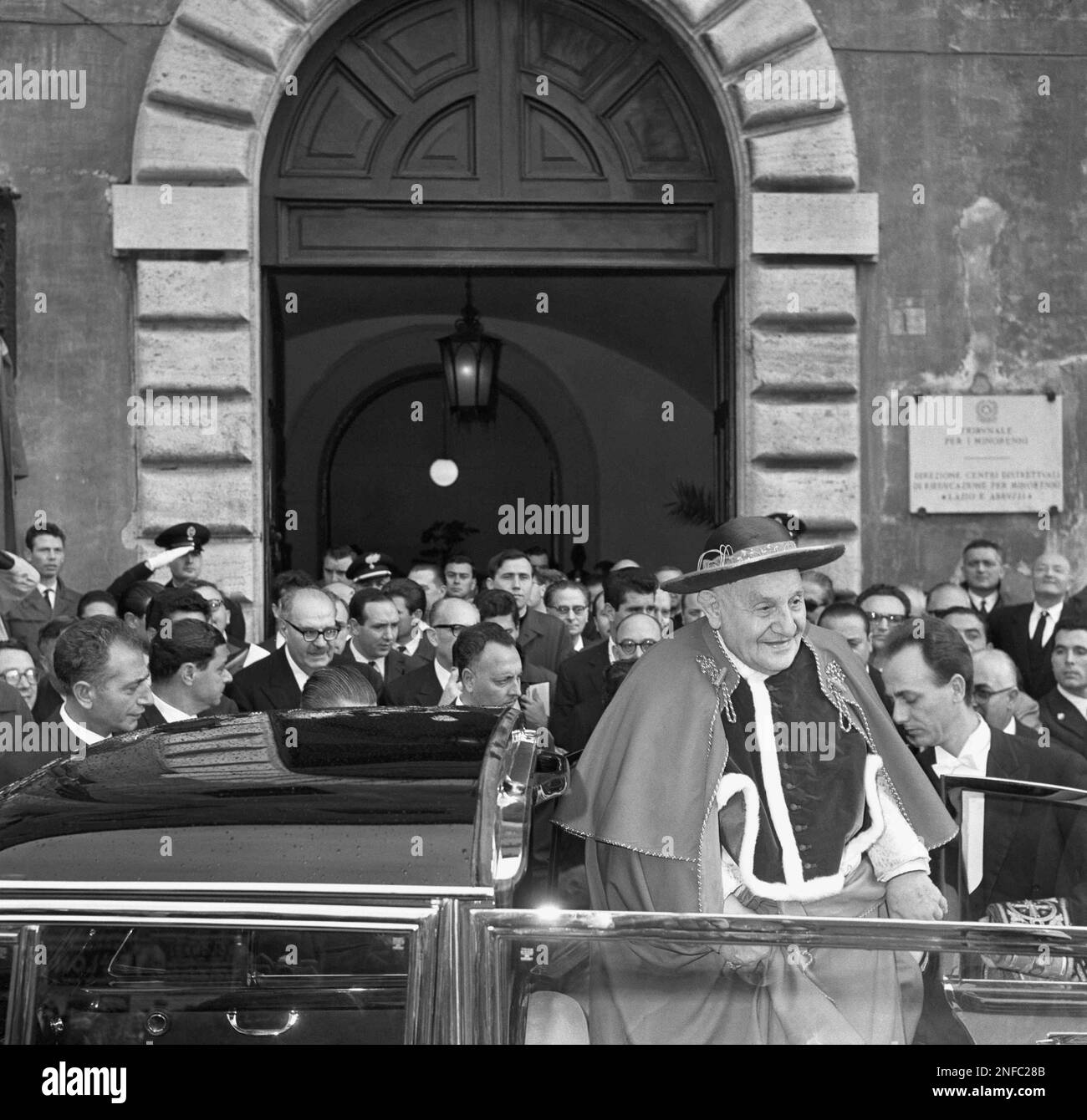 Pope John XXIII enters his car as he leaves the Gabelli Institute, a ...
