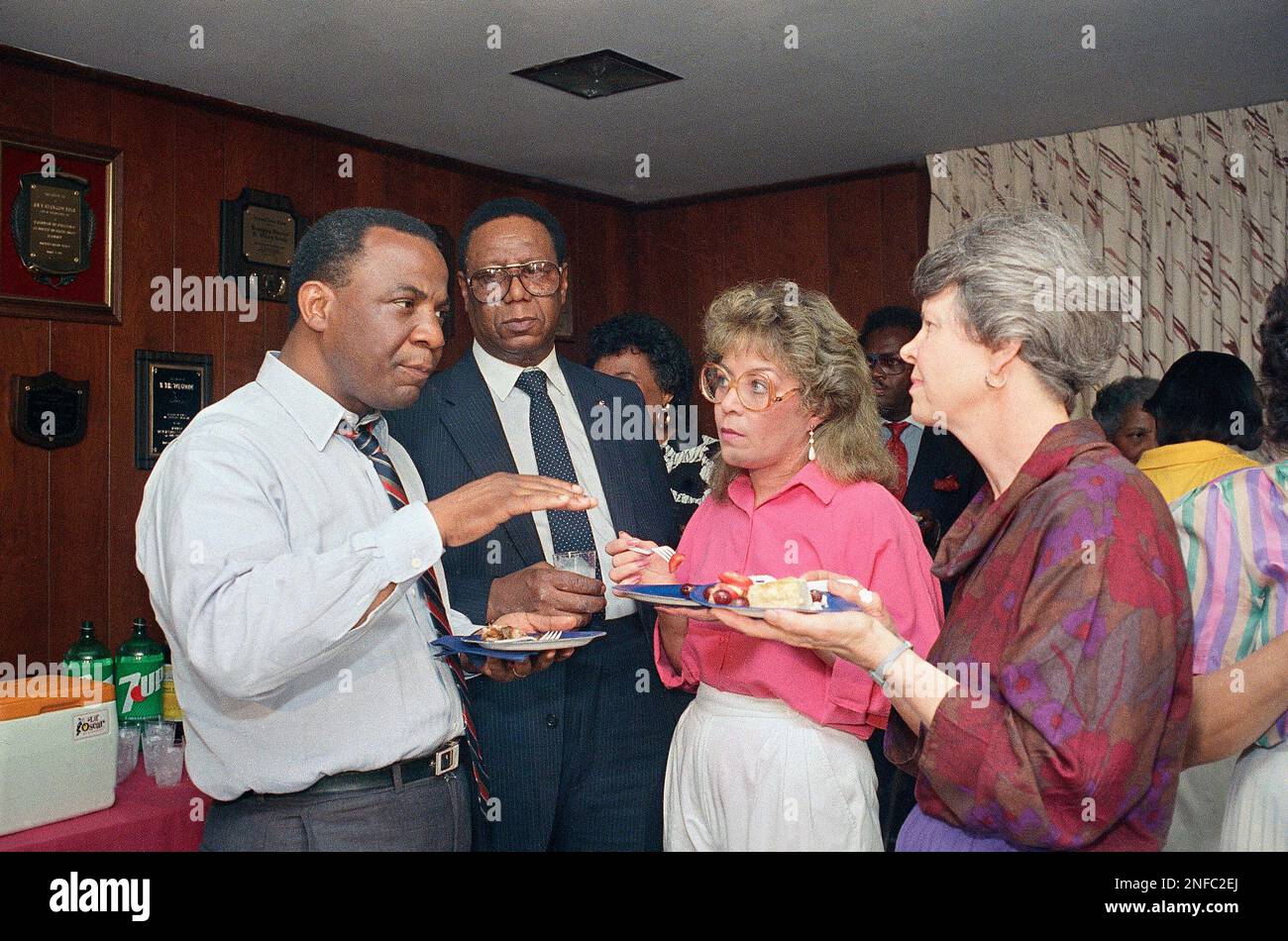 Mayor W. Wilson Goode, right, talks with friends and neighbors at a ...
