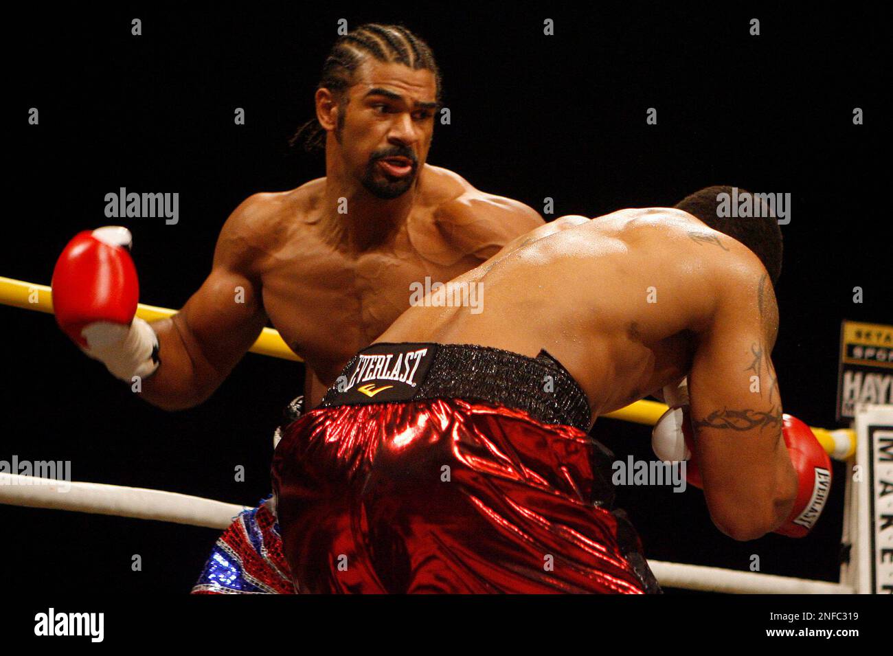 British heavyweight boxer David Haye, left, punches American Monte ...