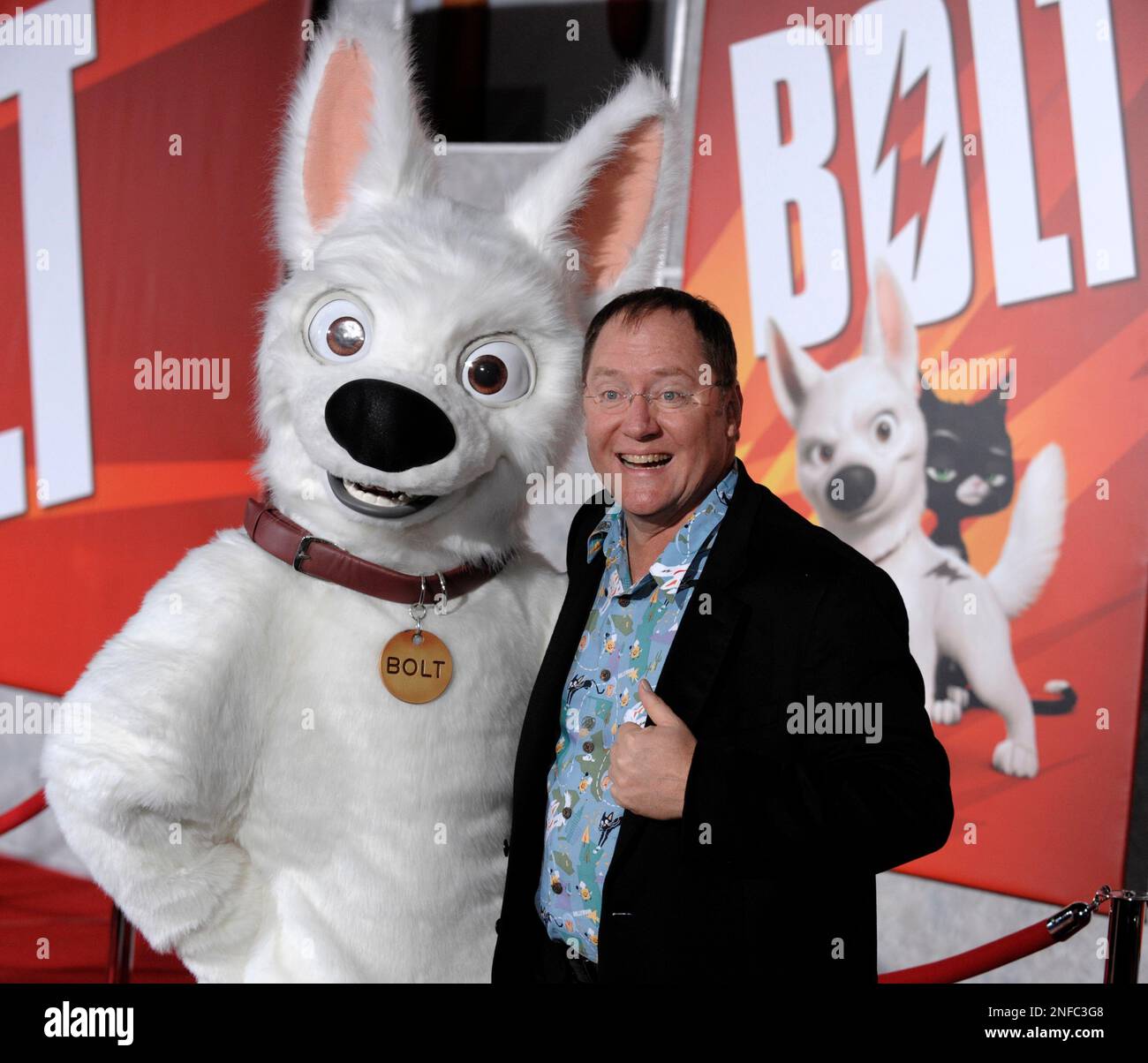 John Lasseter poses with "Bolt" at the premiere of the animated film ...