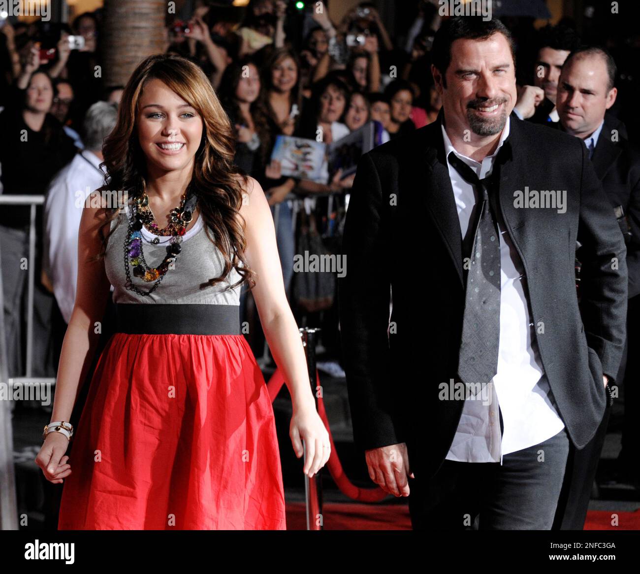 Miley Cyrus, left, and John Travolta, who provide voice work in the ...