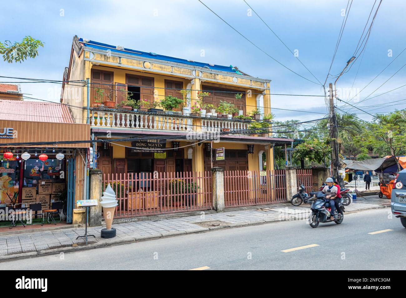 A pretty building with a balcony in Hoi An, Vietnam Stock Photo - Alamy