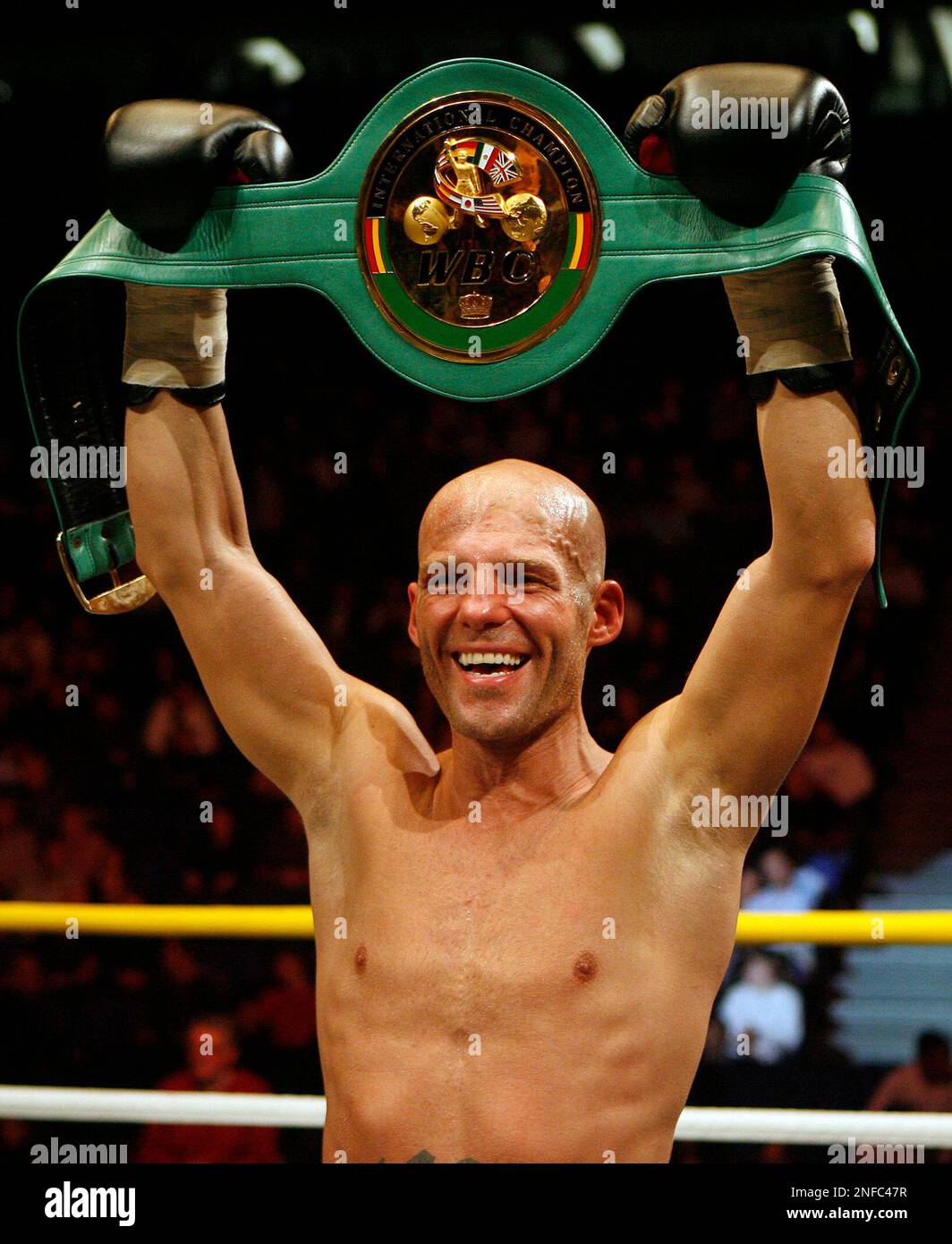 British middleweight Ryan Rhodes celebrates after beating South African ...