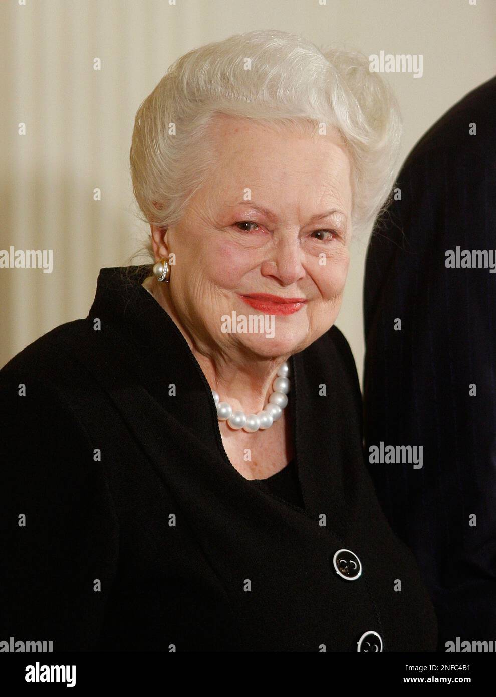 Actress Olivia de Havilland is seen in the East Room of the White House ...
