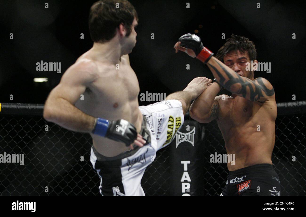 Jorge Gurgel, right, exchanges blows with Aaron Riley during their UFC ...