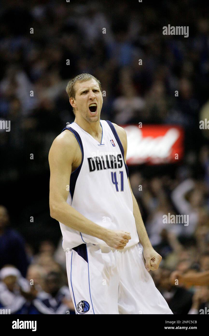 Dallas Mavericks forward Dirk Nowitzki, of Germany, reacts after ...